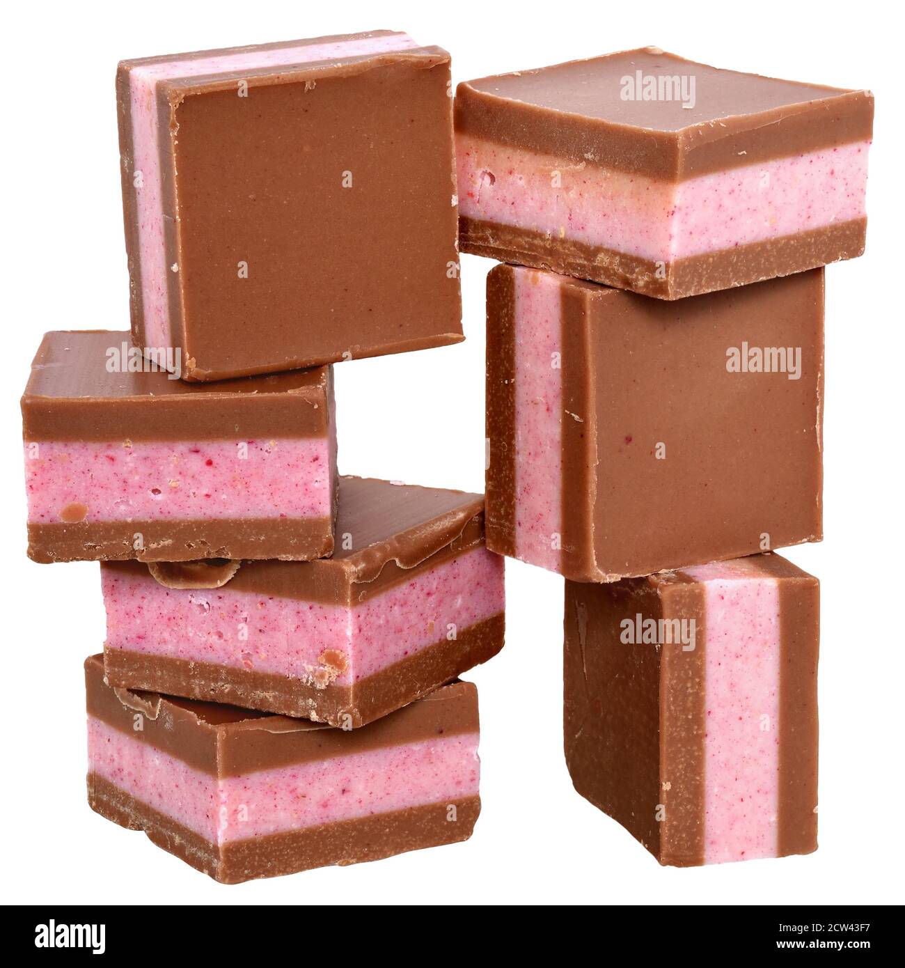 Dark chocolate cubes with fruit berry cream filling isolated on a white ...