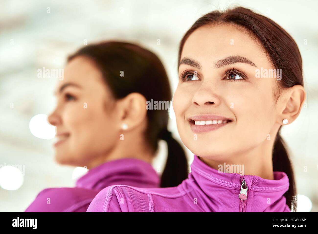 Young woman relaxing in a gym hi-res stock photography and images - Alamy