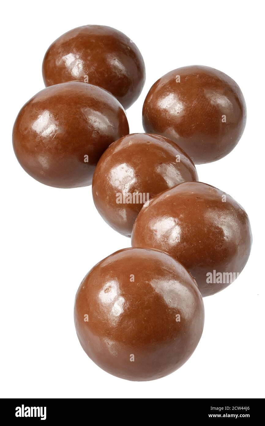 Chocolate balls close up isolated on a white background Stock Photo - Alamy