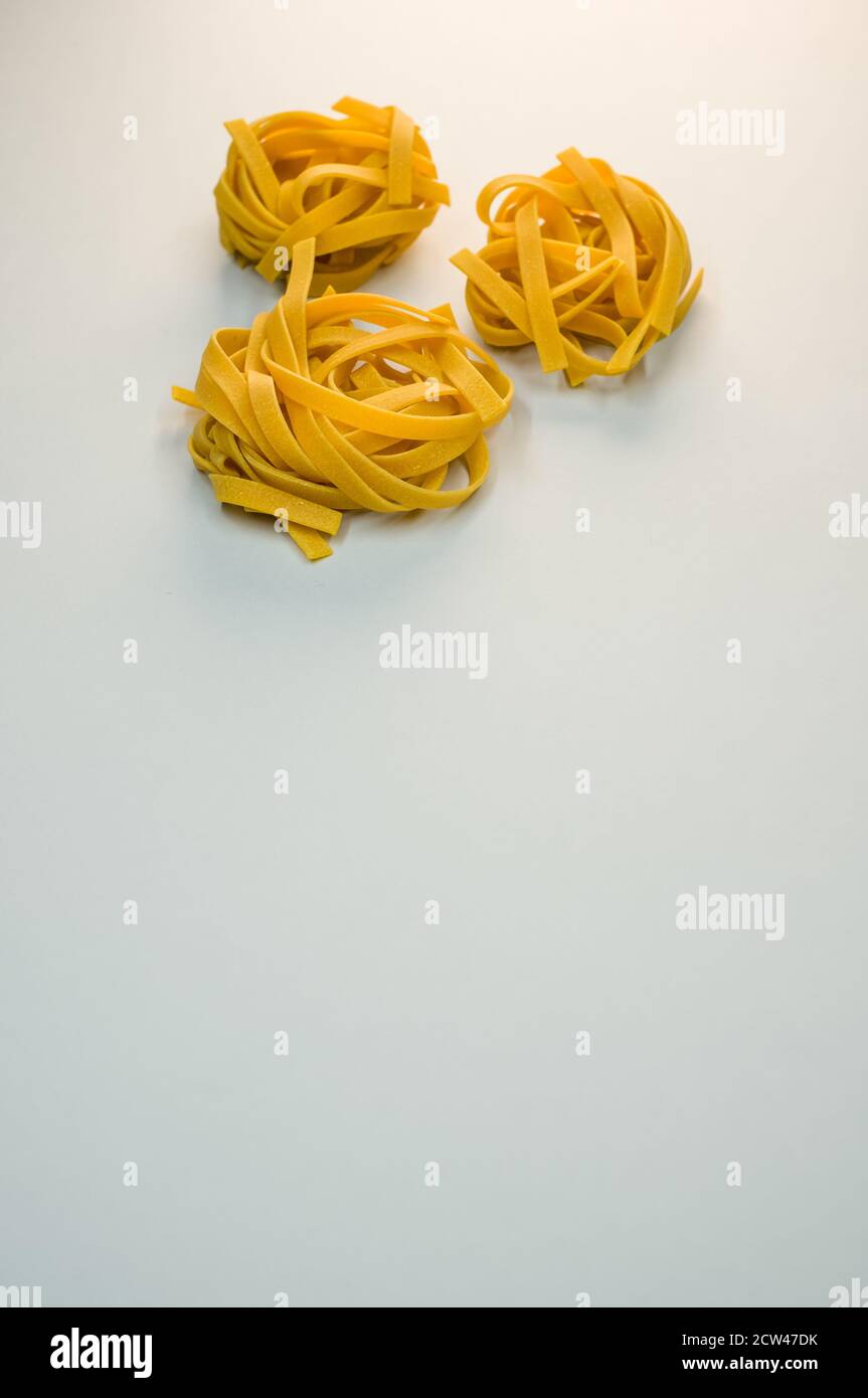 Vertical shot of tagliatelle pasta Stock Photo - Alamy
