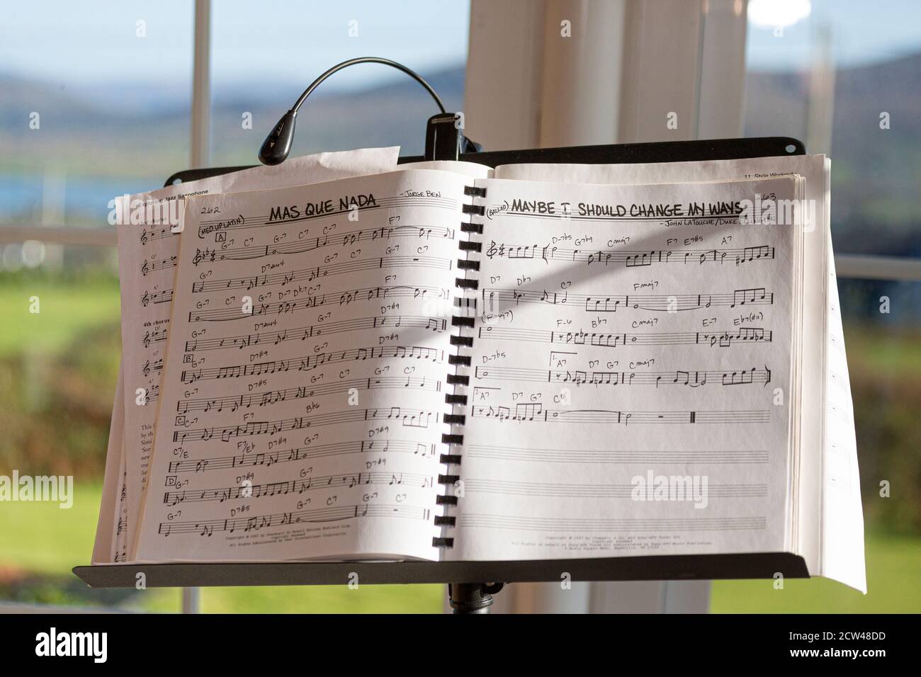 Sheet music on stand Stock Photo - Alamy