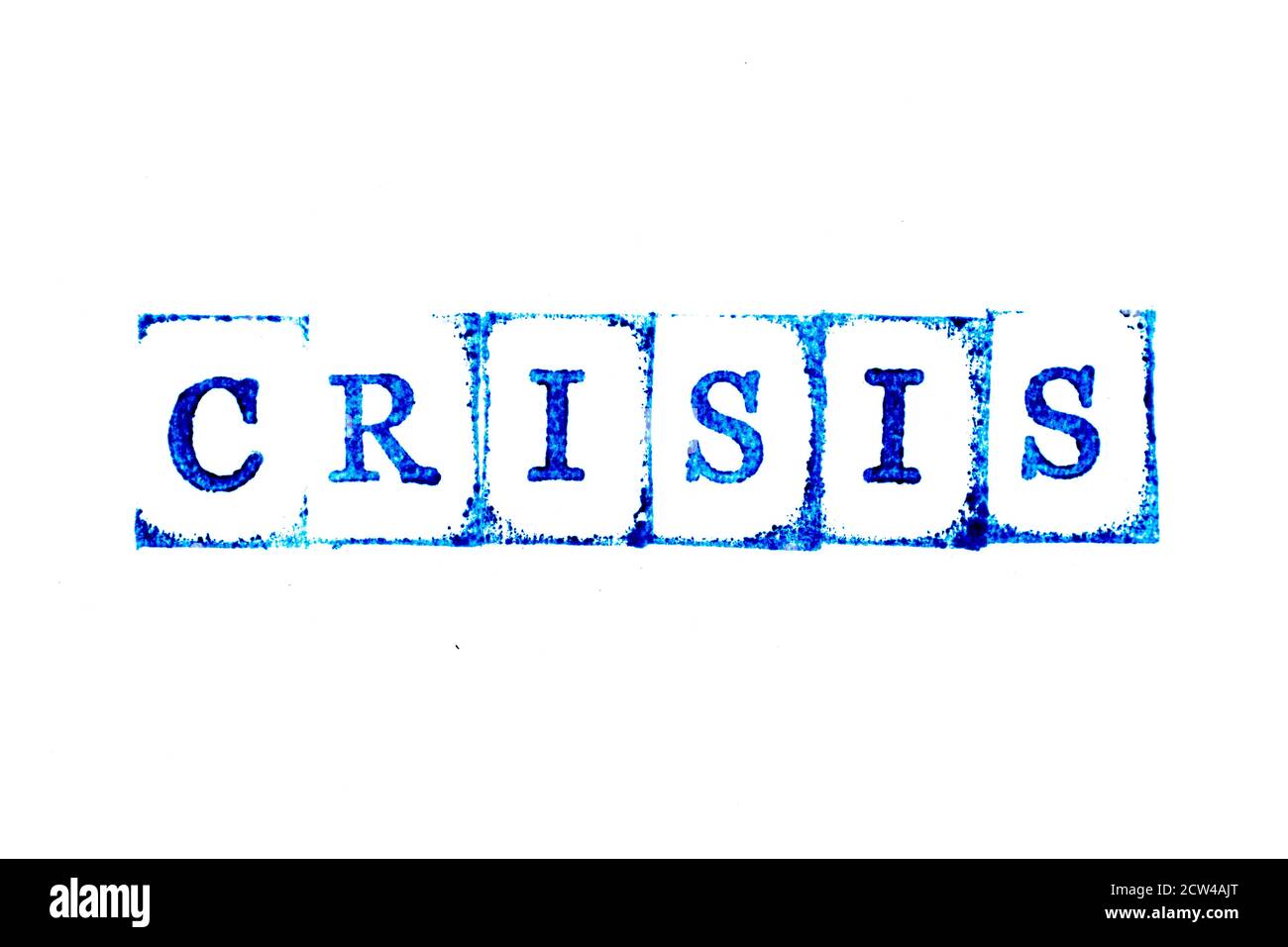 Blue color ink of rubber stamp in word crisis on white paper background ...