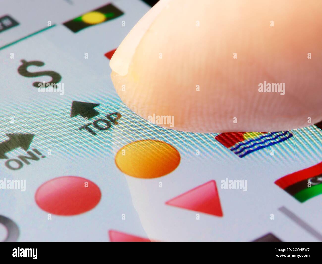 Closeup finger taping icon on screen keyboard Stock Photo - Alamy
