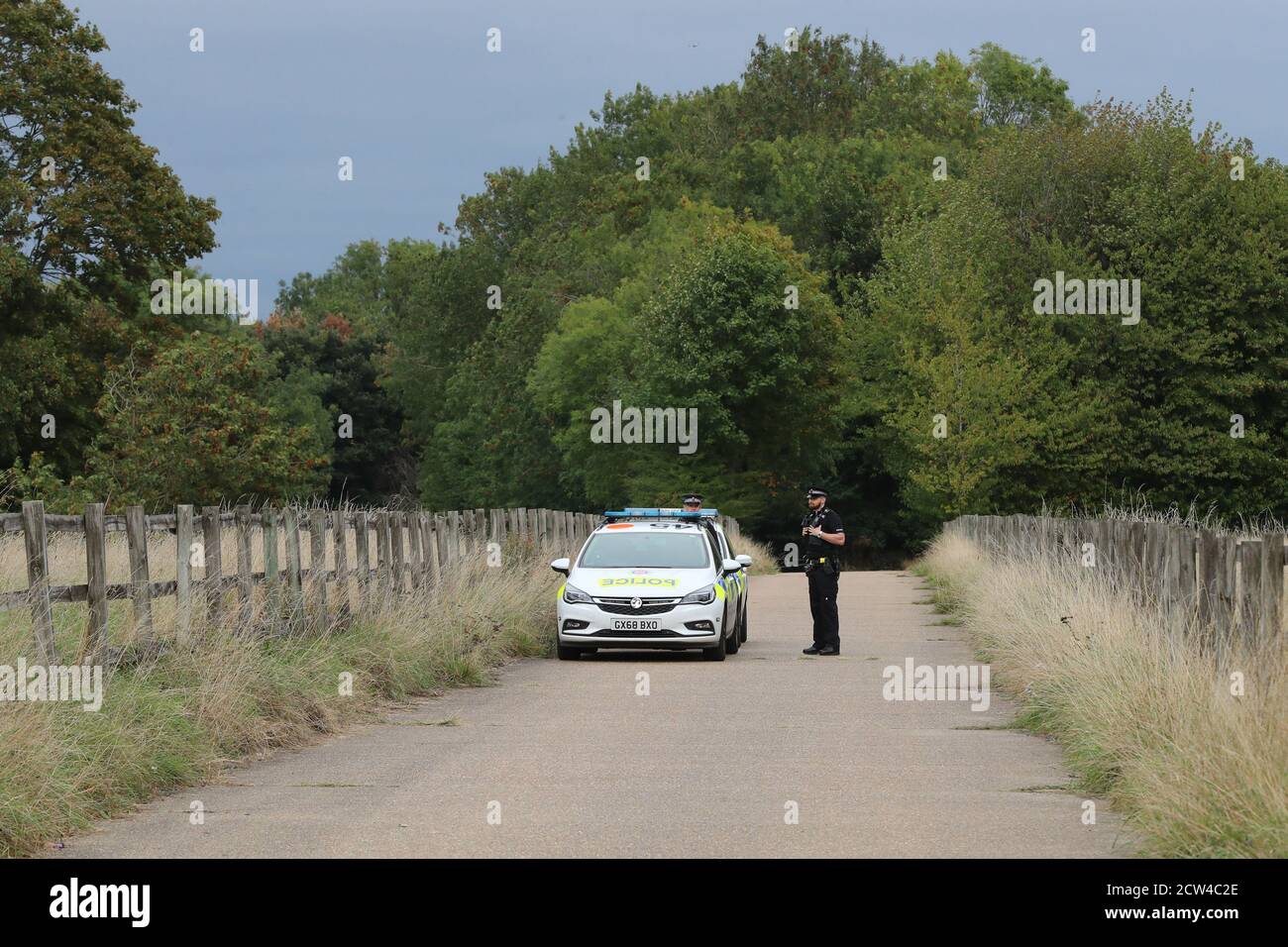 Police at Courtlands Farm in Banstead, Surrey, where officers carried ...