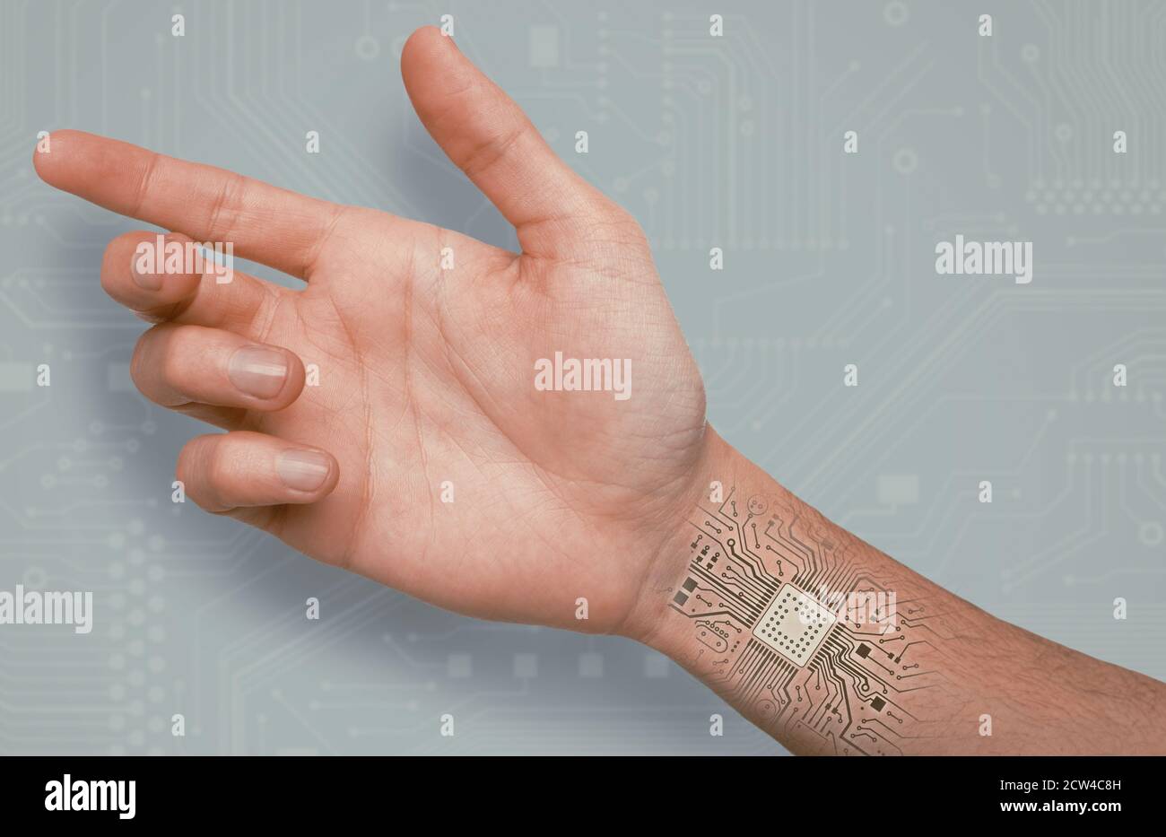 Male Hand With Integrated Microchip Circuit Over Gray Background ...