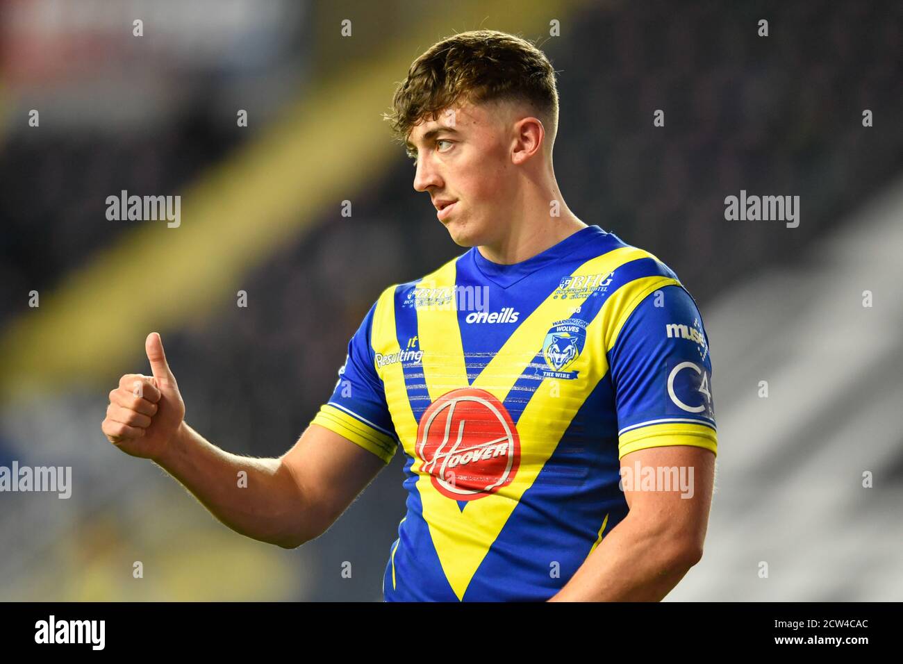 Matty Ashton (26) of Warrington Wolves gives a thumbs up to his team ...