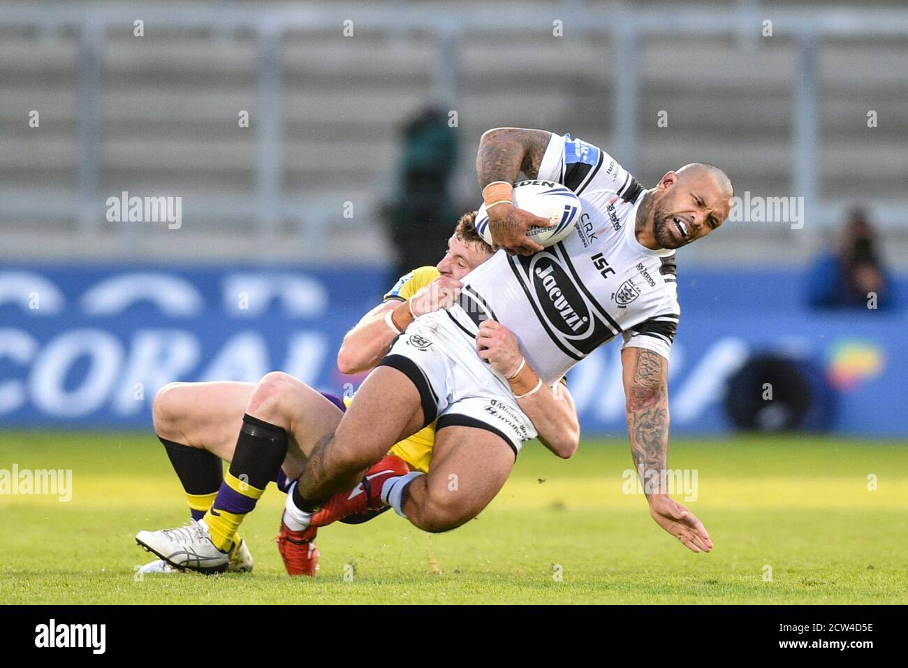 Manu Mau (12) of Hull FC is brought down Stock Photo - Alamy