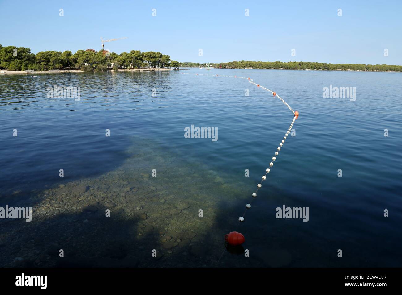 rope with buoys to fence off a safe swimming area on the beach Stock ...