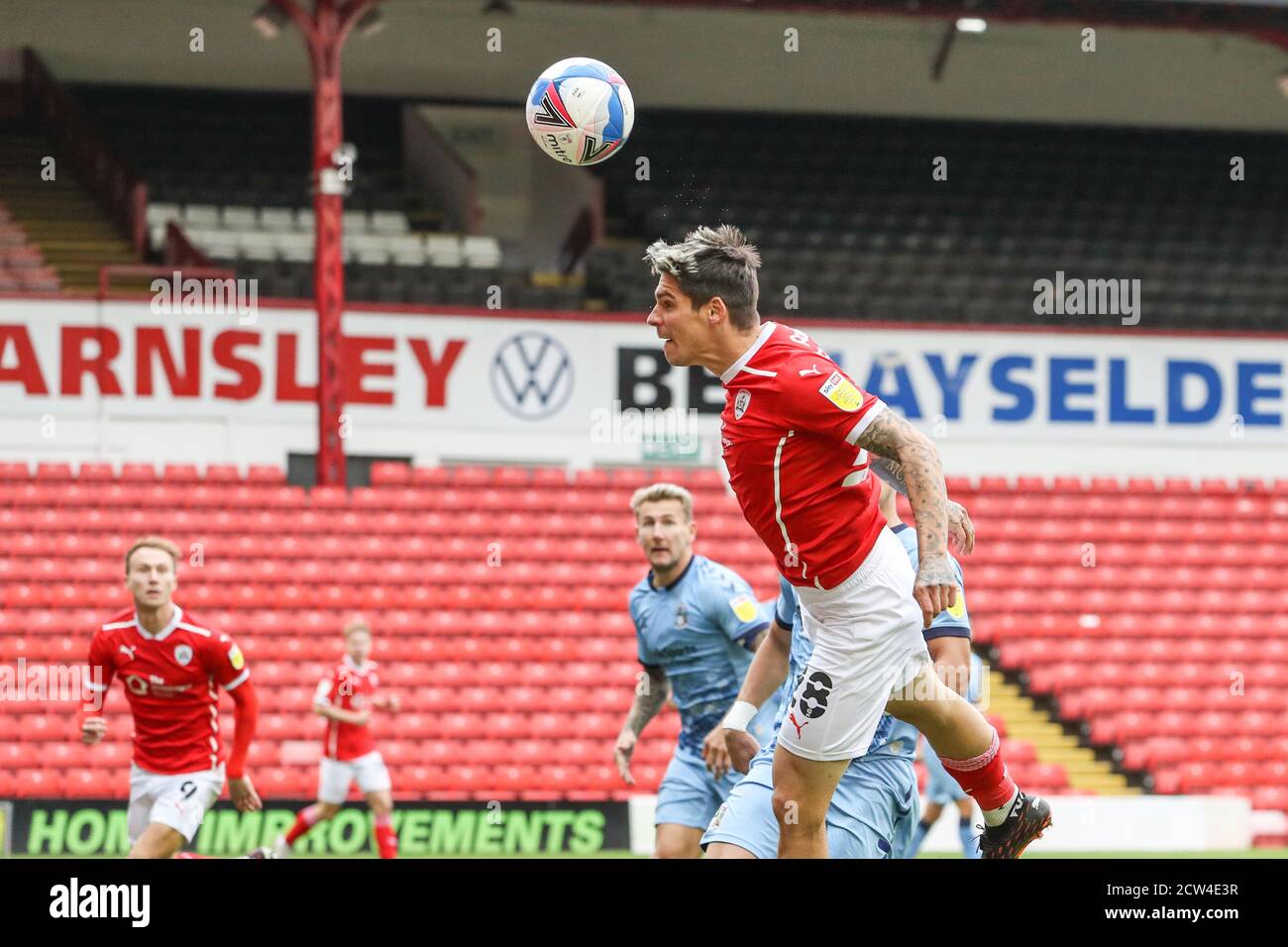 Dominik Frieser (28) of Barnsley heads wide on goal Stock Photo - Alamy