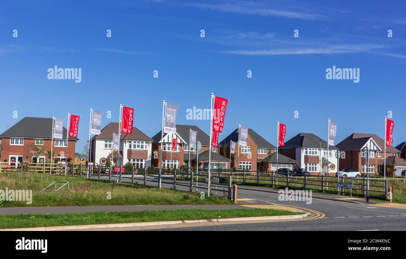 Modern housing development sales office and houses. Redrow builders ...