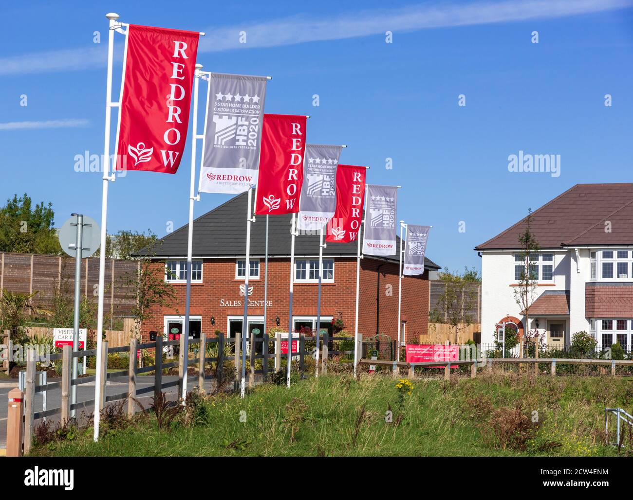 Modern housing development sales office and houses. Redrow builders ...
