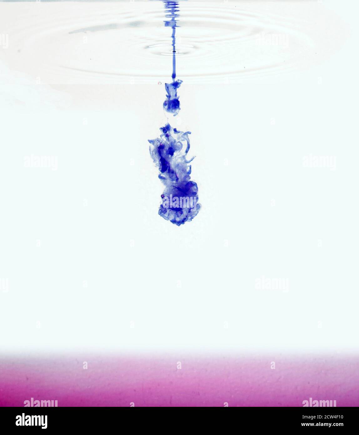 Ink dissolving in water Stock Photo - Alamy