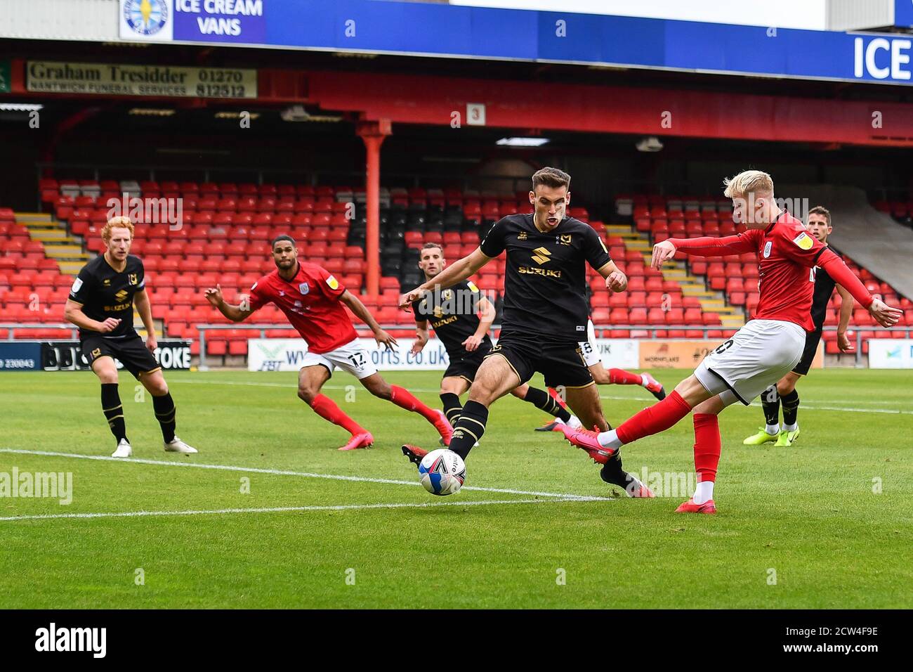Charlie Kirk (10) of Crewe Alexandra takes a shot at goal Stock Photo ...