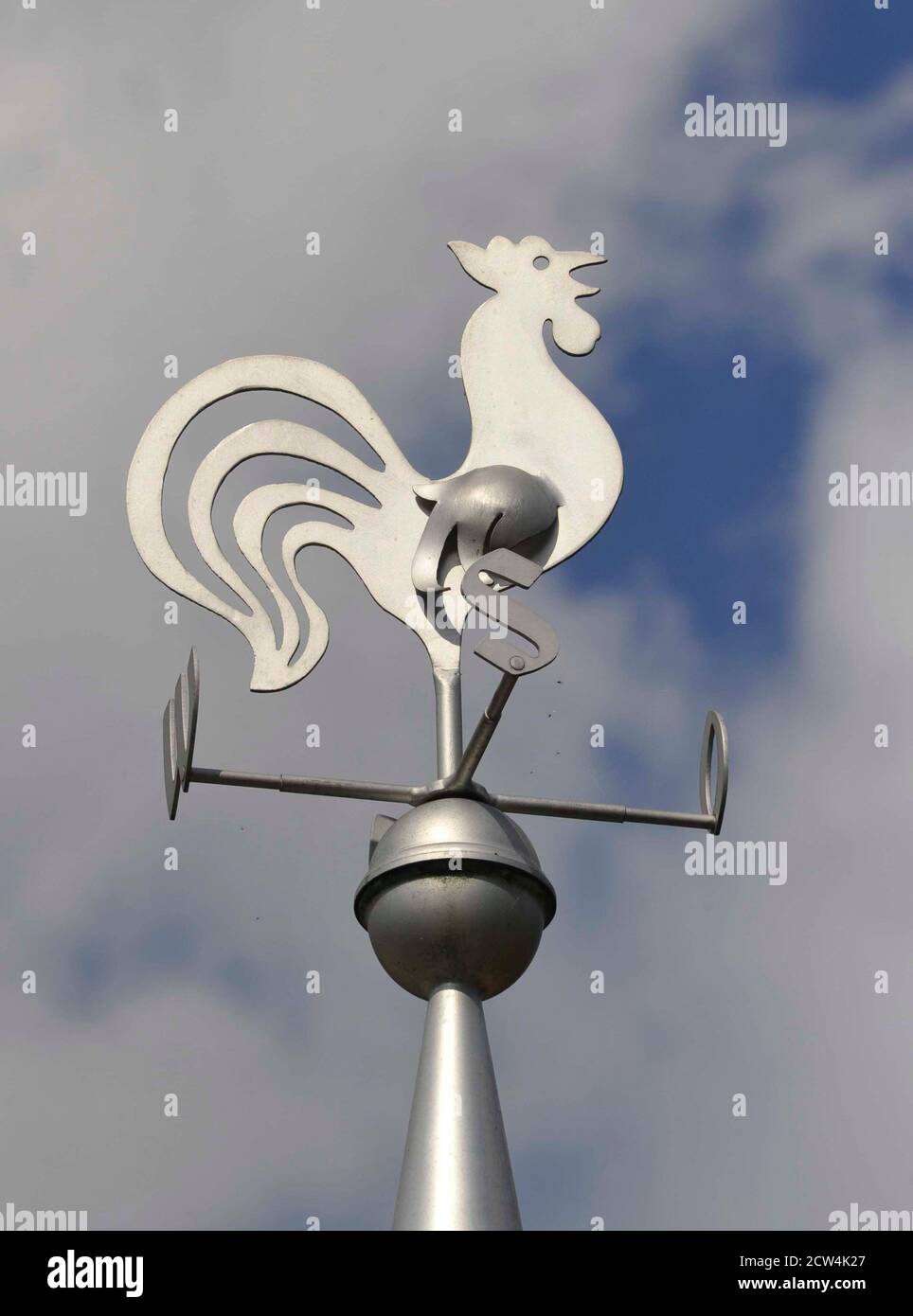Weathercock on the roof of a building for wind measurement Stock Photo ...