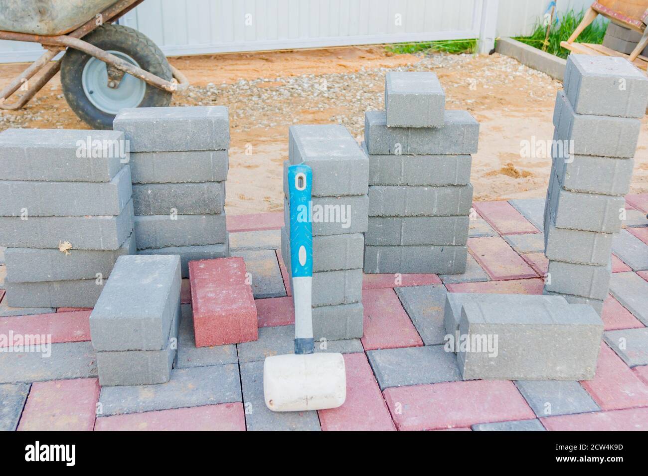 red and gray concrete paving blocks. Road Paving, construction Stock ...