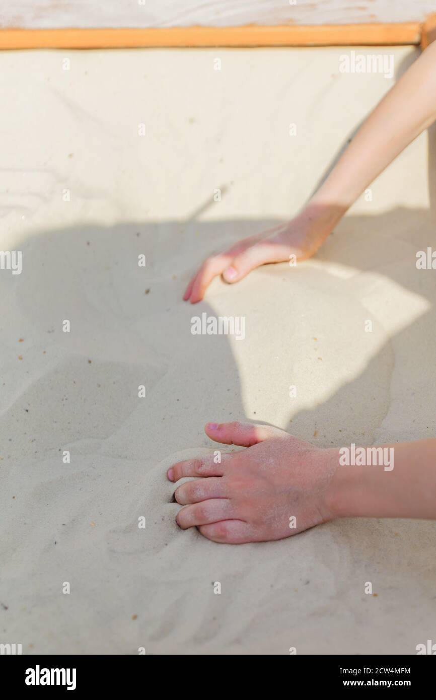 close up of child's hands playing in sandbox Stock Photo - Alamy