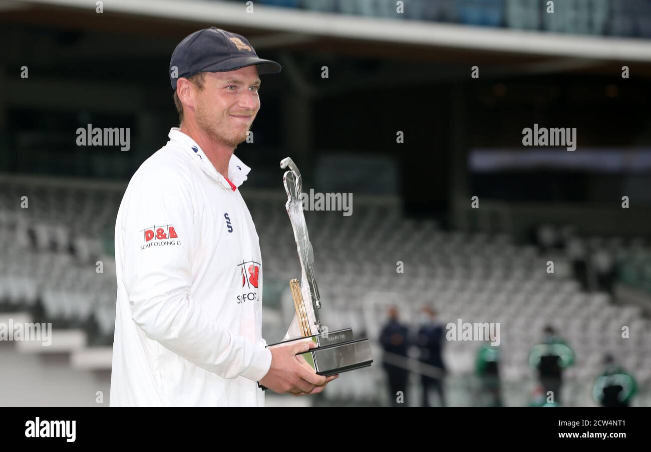 Essex's Tom Westley poses with the trophy after day five of the Bob ...