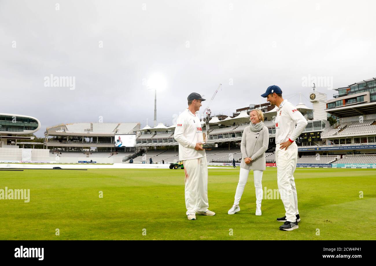 Essex's Tom Westley (left) with the trophy alongside Bob Willis' wife ...