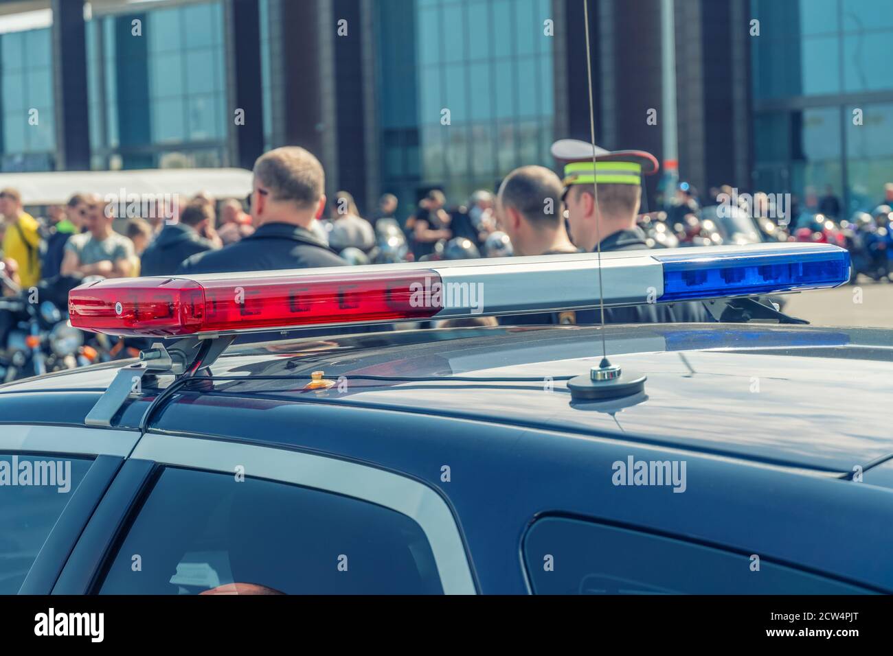 Close-up of flashing lights on a police car. Police flashing car roof ...