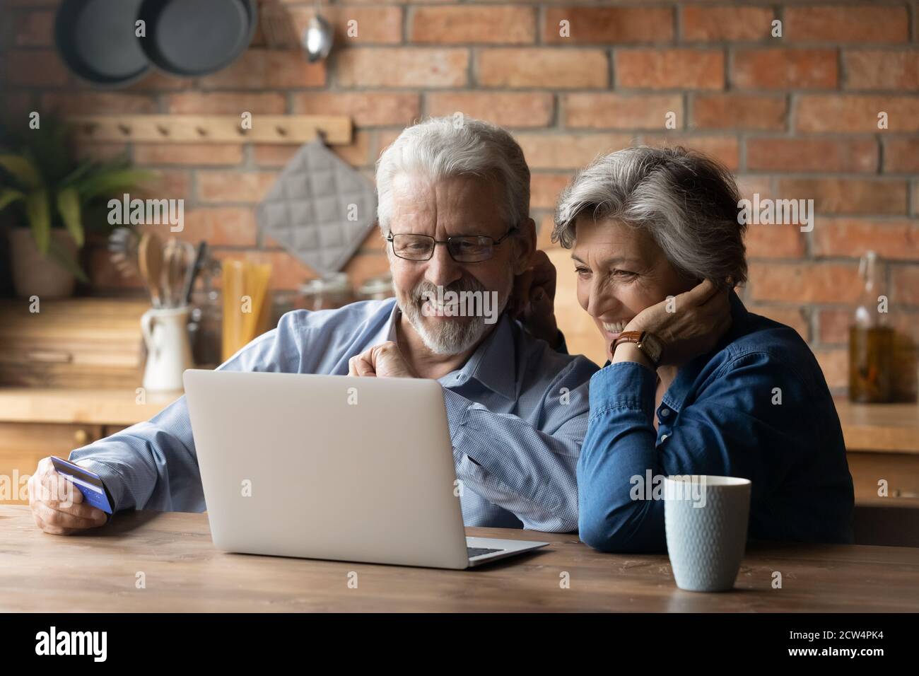 Happy caucasian woman using bank hi-res stock photography and images ...