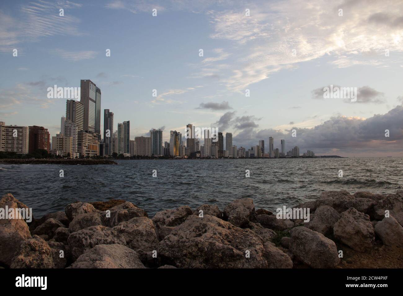 Coastline of cartagena in colombia showing rocks in front, water & the ...