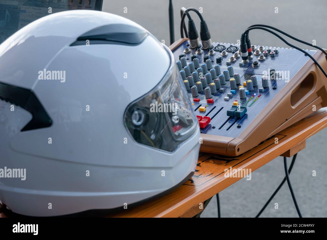 Helmet on the background of the sound console. sound test for the ...