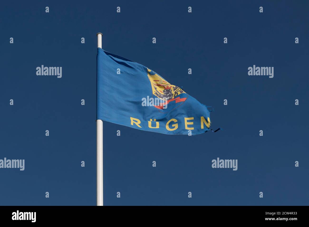 Flag with coat of arms of Rügen Stock Photo - Alamy