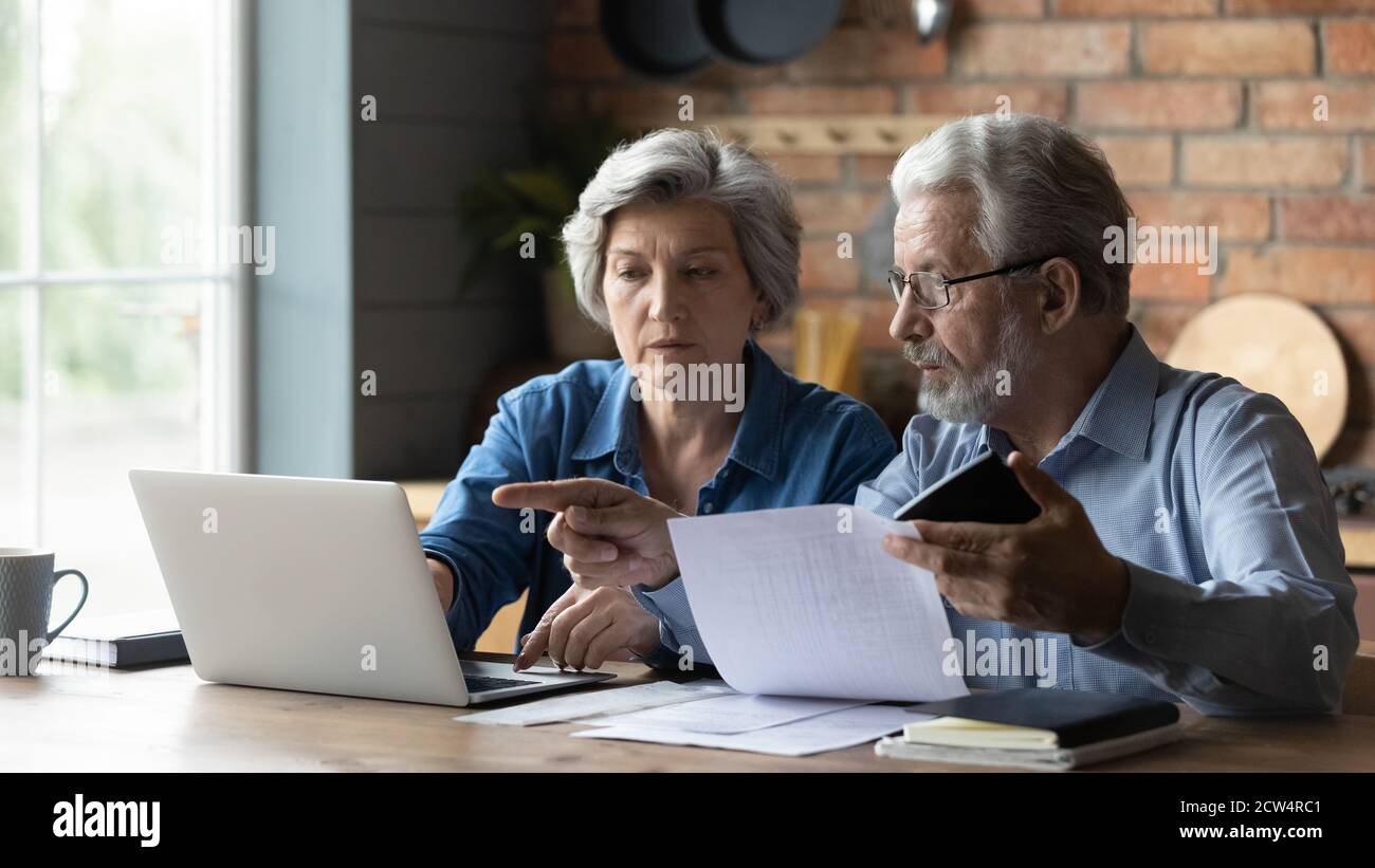 Pensioner laptop bills hi-res stock photography and images - Alamy