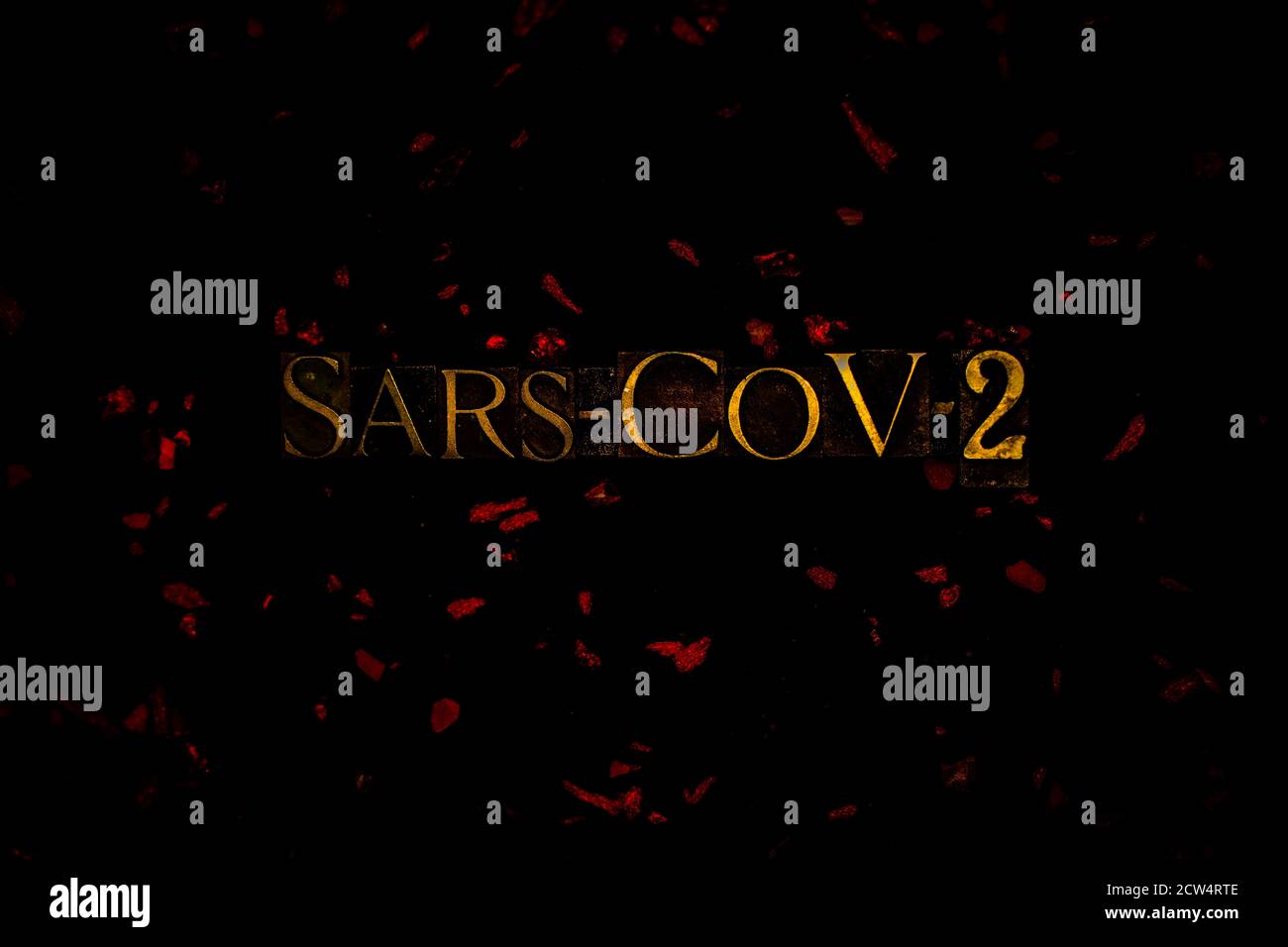 Sars-Cov-2 text in flaming copper letters on black background with ...