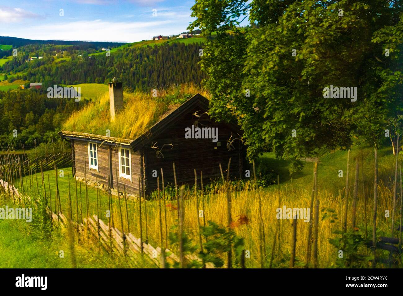 grass roof old shed at Strandefjord shore seen from E16-European route ...