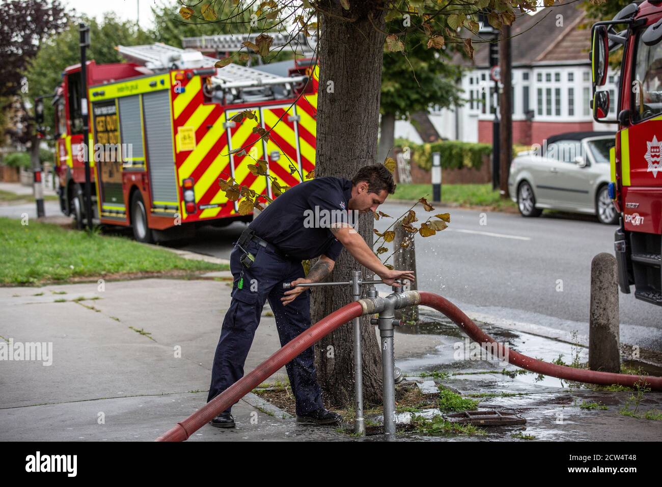 London fire brigade uniform hi-res stock photography and images - Alamy