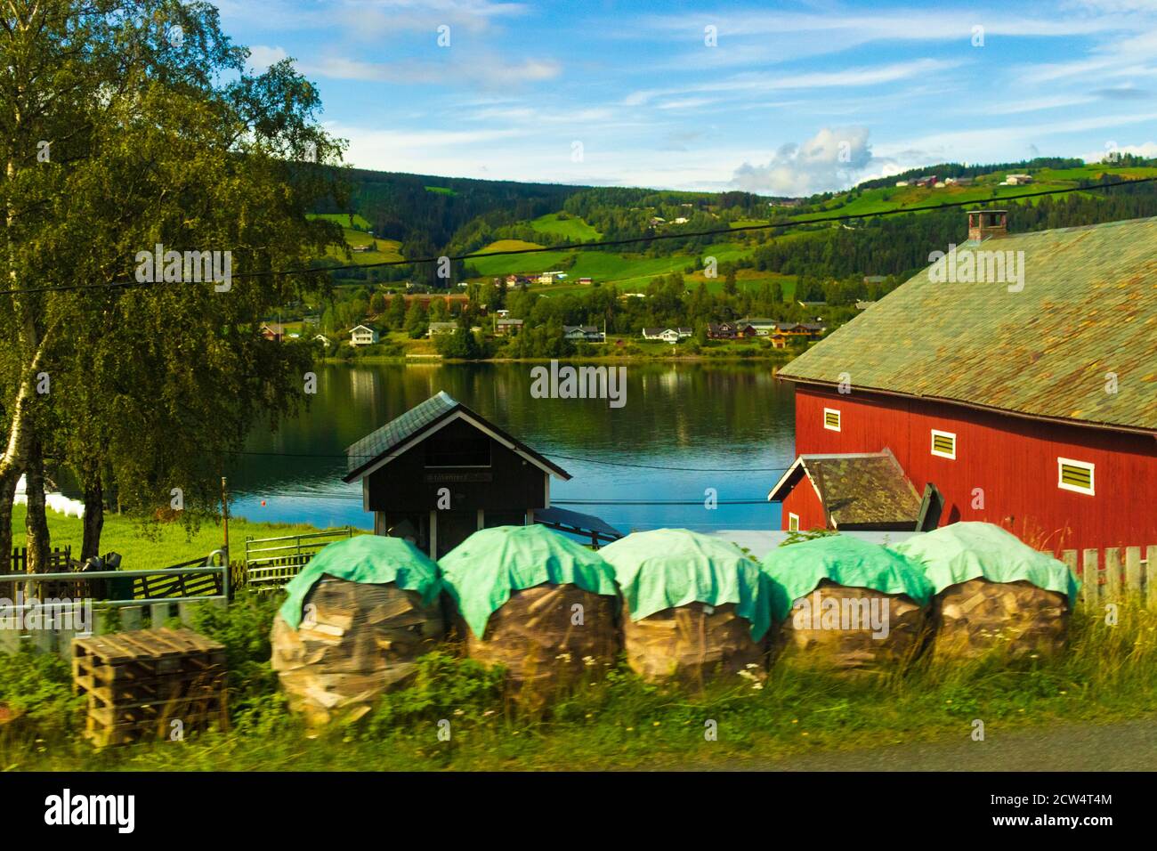 Farmhouses at Slidrefjord lake shore seen from E16-European route from ...