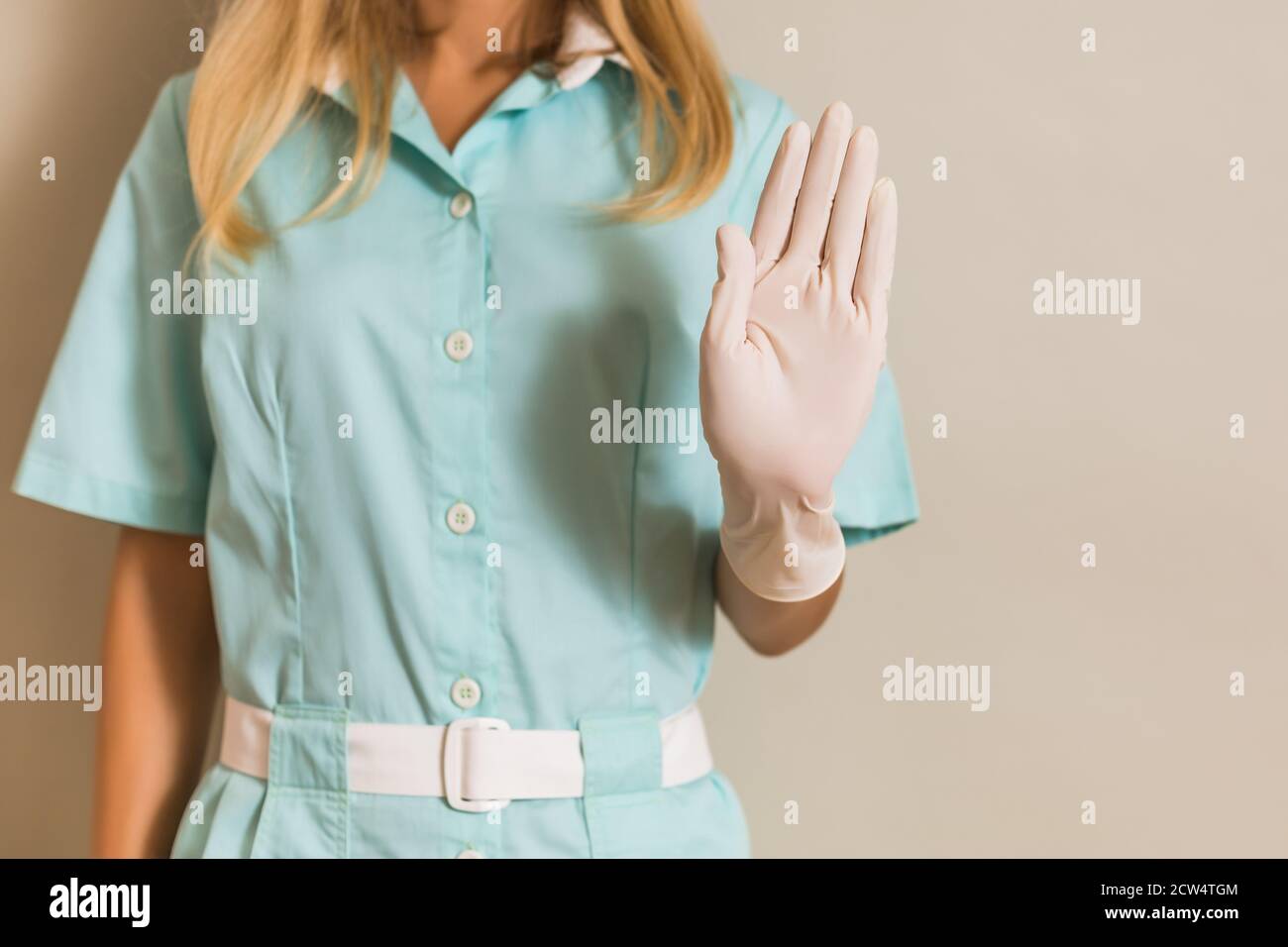Image of medical nurse showing stop sign Stock Photo - Alamy