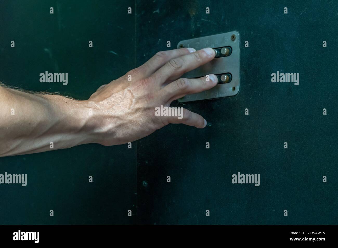 man's hand dials the code from the door intercom close up Stock Photo ...