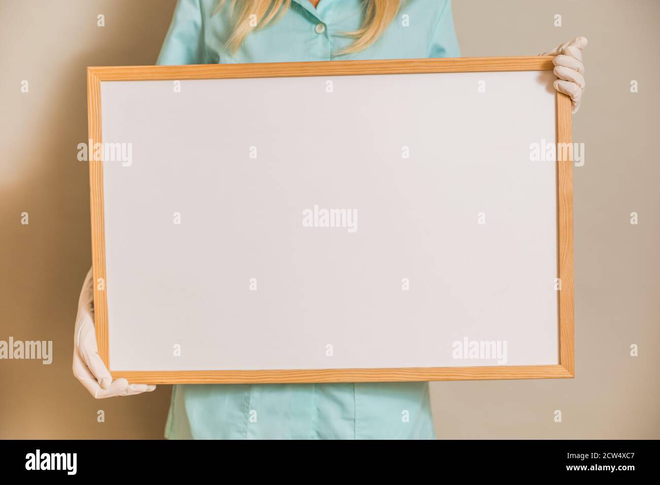 Image of medical nurse holding whiteboard Stock Photo - Alamy