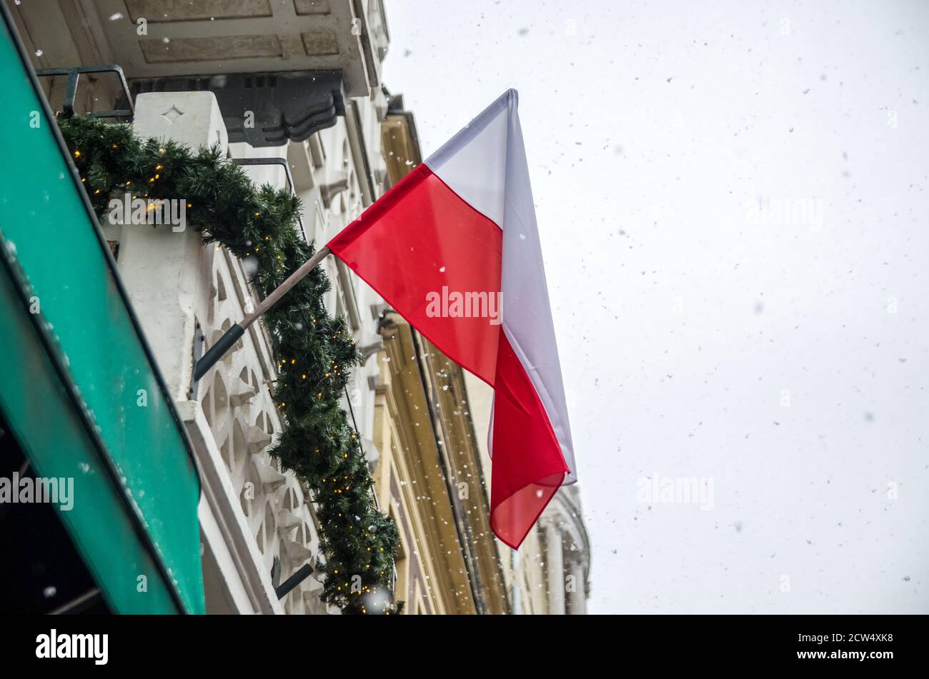 Polish flag on the building against the sky Stock Photo - Alamy