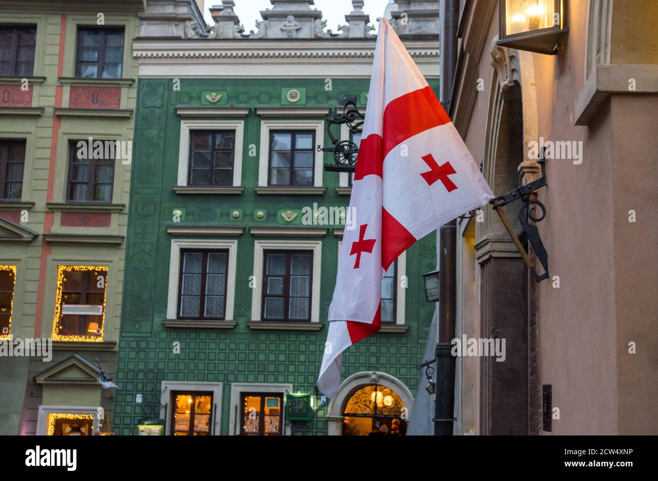 Polish flag on the building Stock Photo - Alamy
