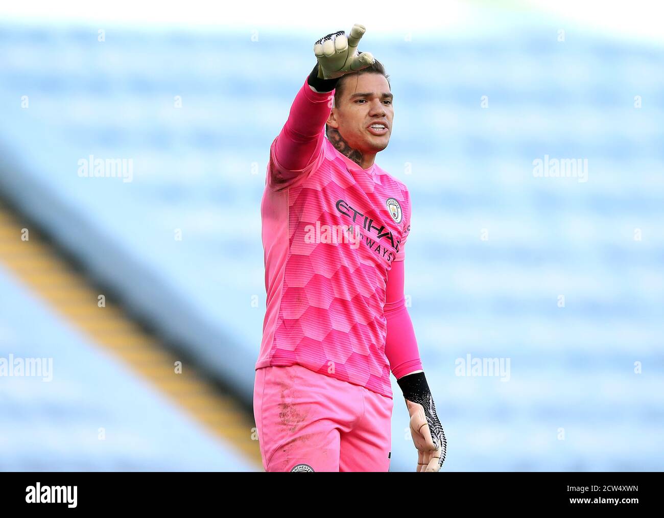 Manchester City goalkeeper Ederson instructs his players during the ...