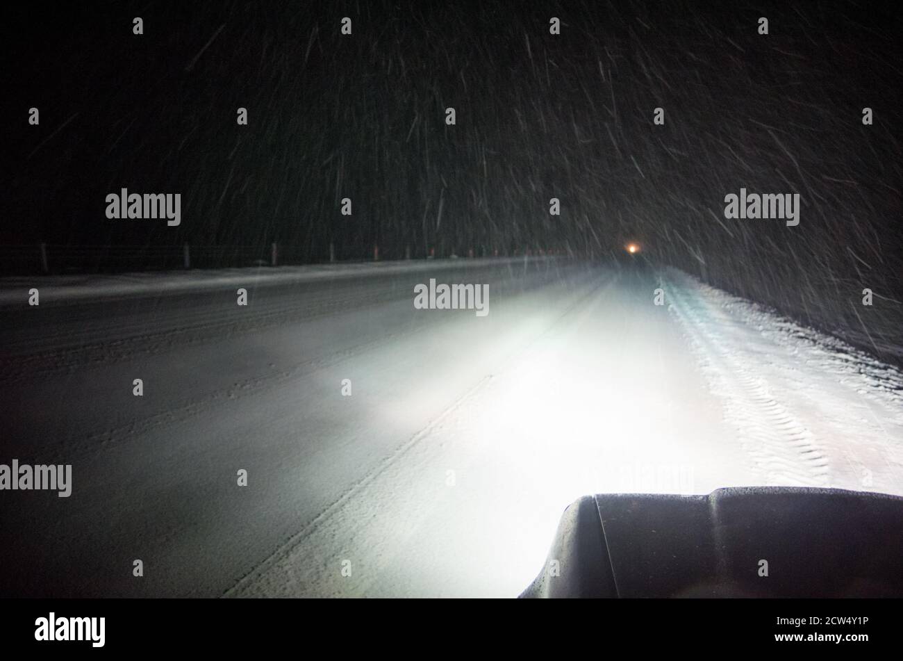Dangerous Winter Road at Night Stock Photo - Alamy