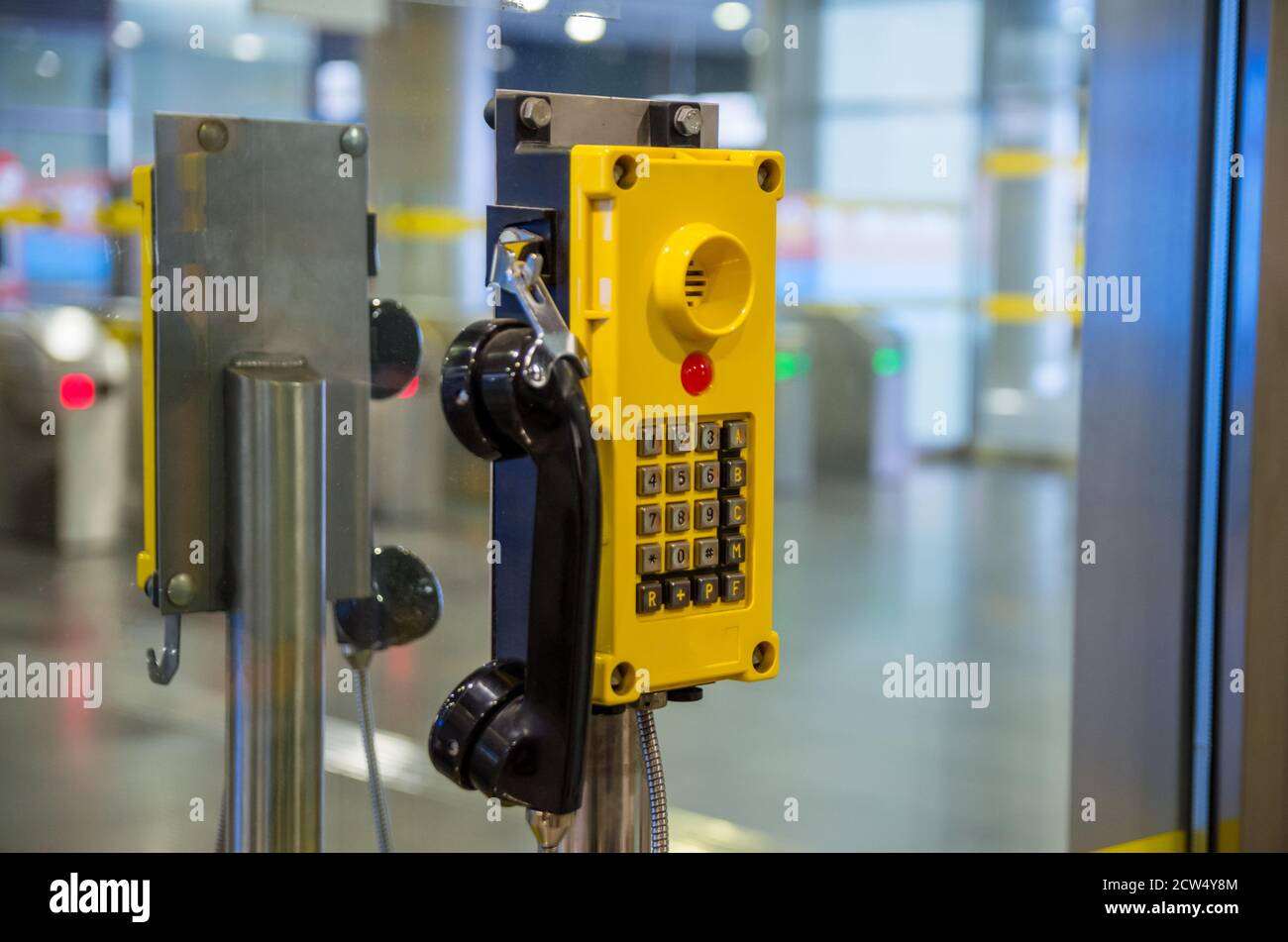 The emergency telephone at the metro Stock Photo - Alamy