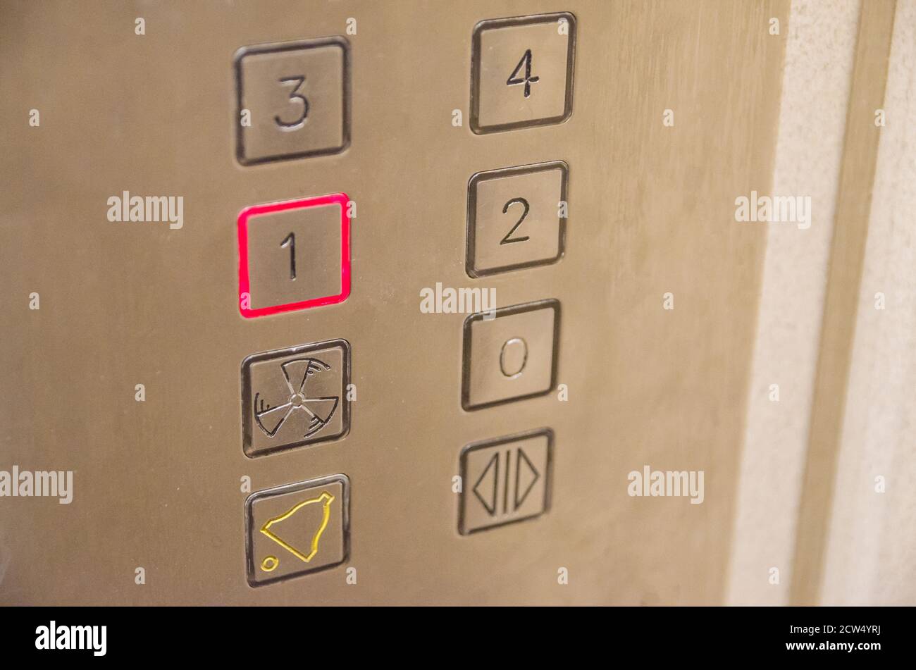 stainless steel dial of a passenger lift with glowing buttons Stock ...