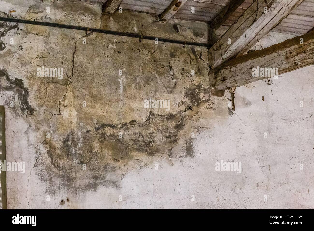 damp spots in the wall caused by water infiltration Stock Photo - Alamy