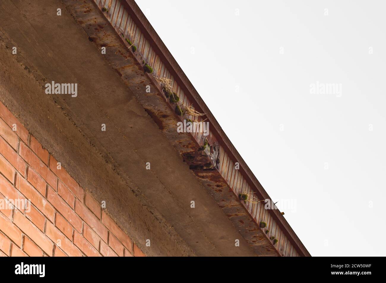 perforated gutters in old industrial warehouse Stock Photo - Alamy