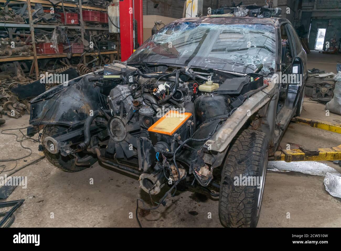 Semi-disassembled car after an accident close-up on the auto Assembly ...