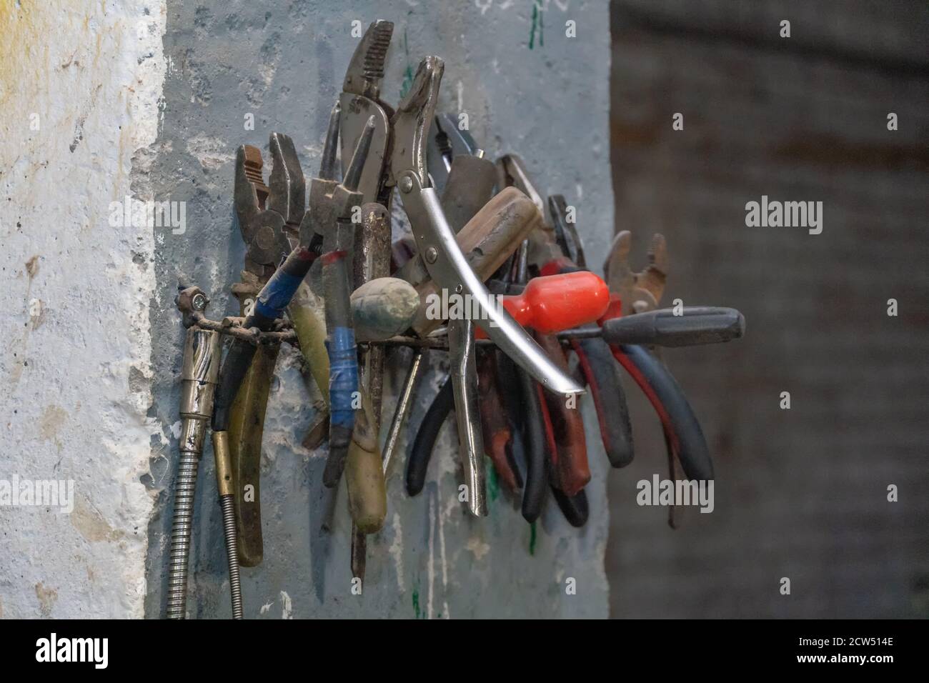 Wood wall axe hanging hi-res stock photography and images - Alamy