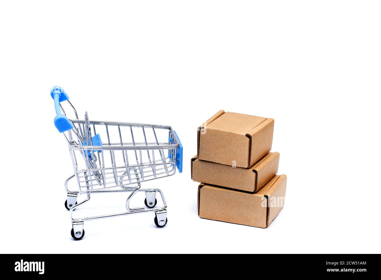 Shopping cart full of cardboard boxes, isolated on white background ...