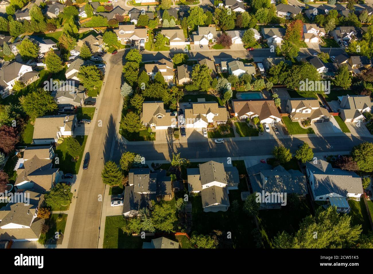 Subdivision homes lines by streets and cars Stock Photo - Alamy