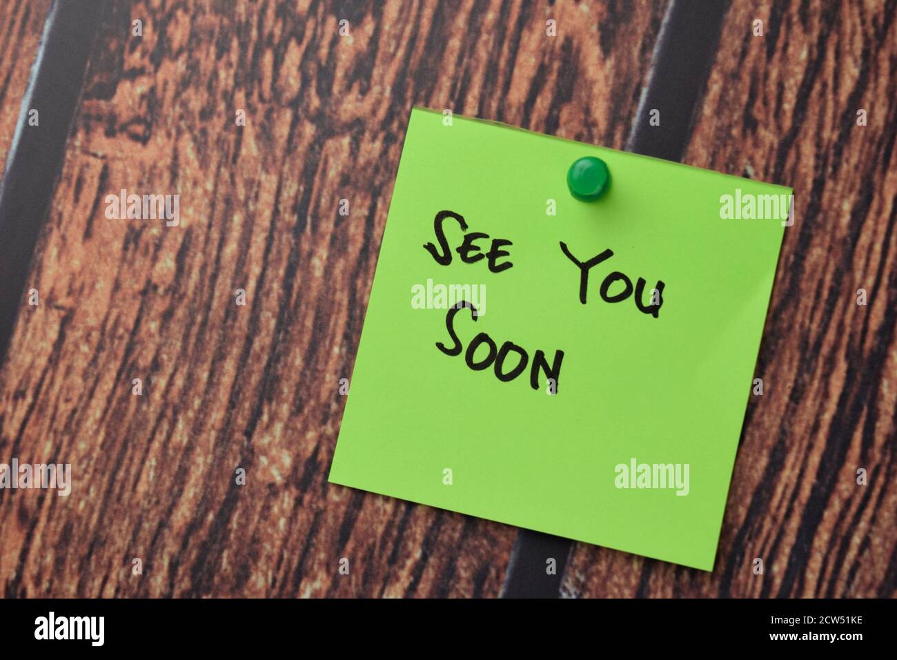 See You Soon write on sticky notes isolated on office desk Stock Photo ...