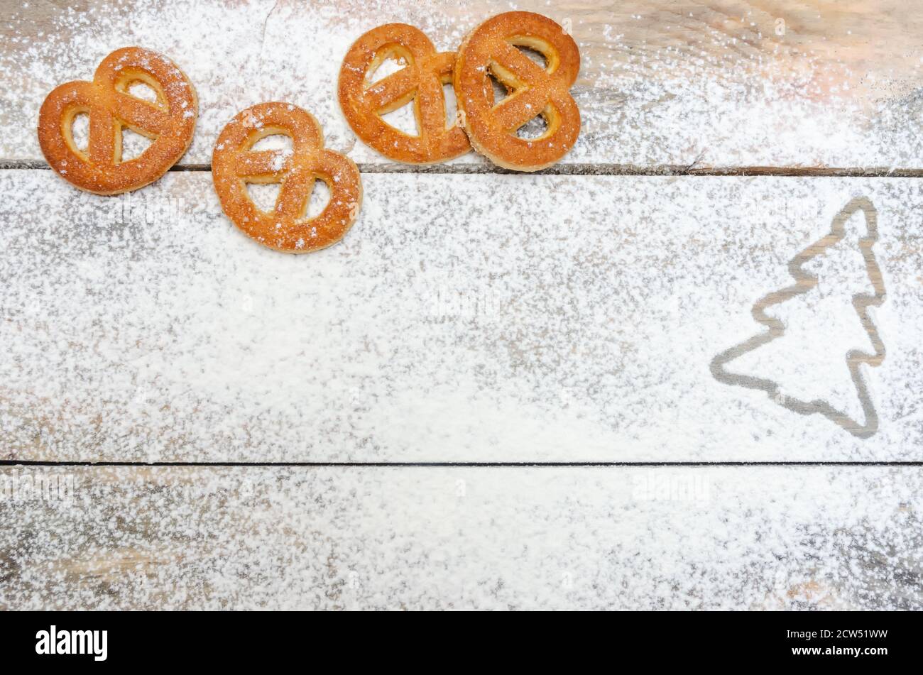 Creative winter baking background. Silhouette of a Christmas tree made ...