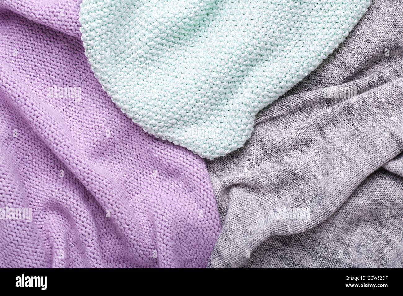 Gray, mint and lilac knitting wool texture background Crocheted fabric ...